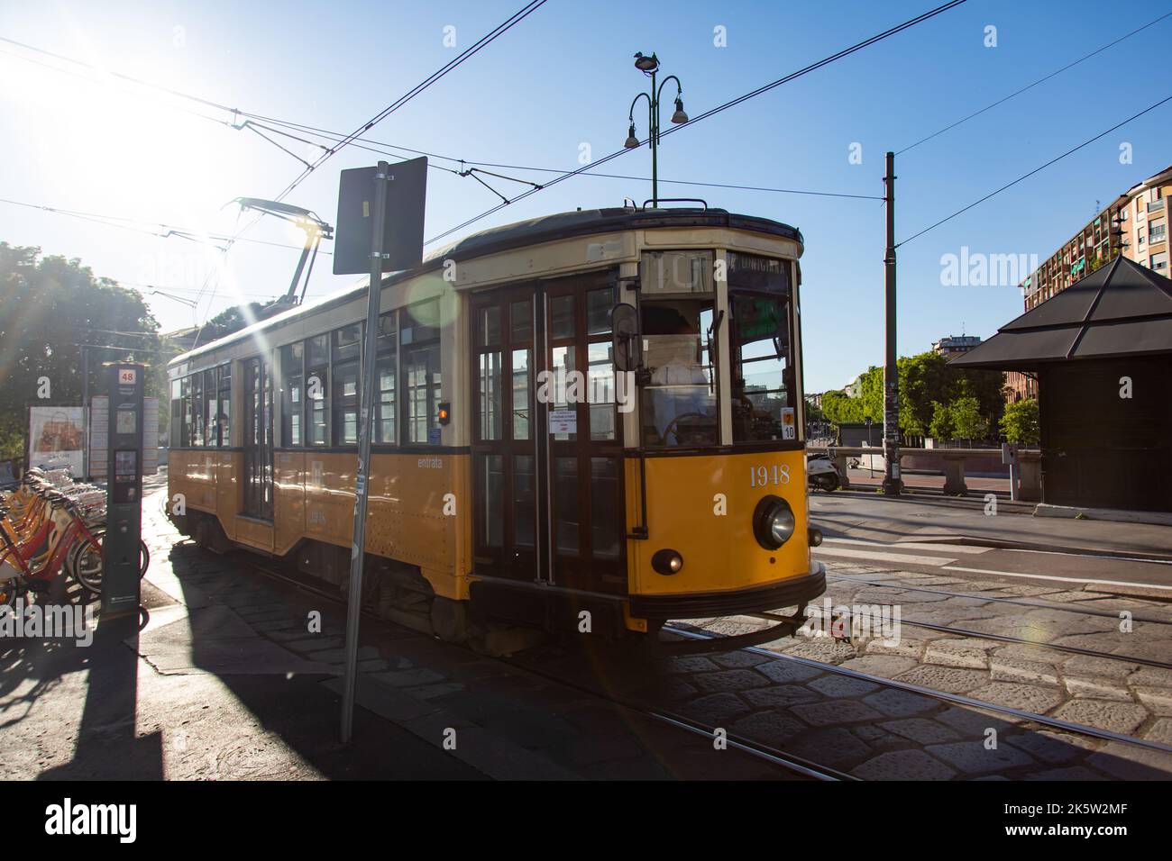 Milan, Italy - March 29, 2020: a typical yellow tram in Milan in the ...