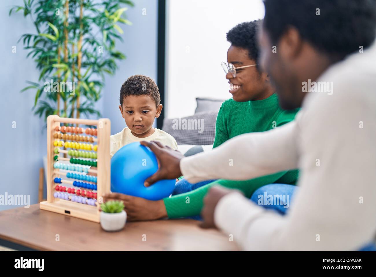 African american family playing with abacus at home Stock Photo - Alamy