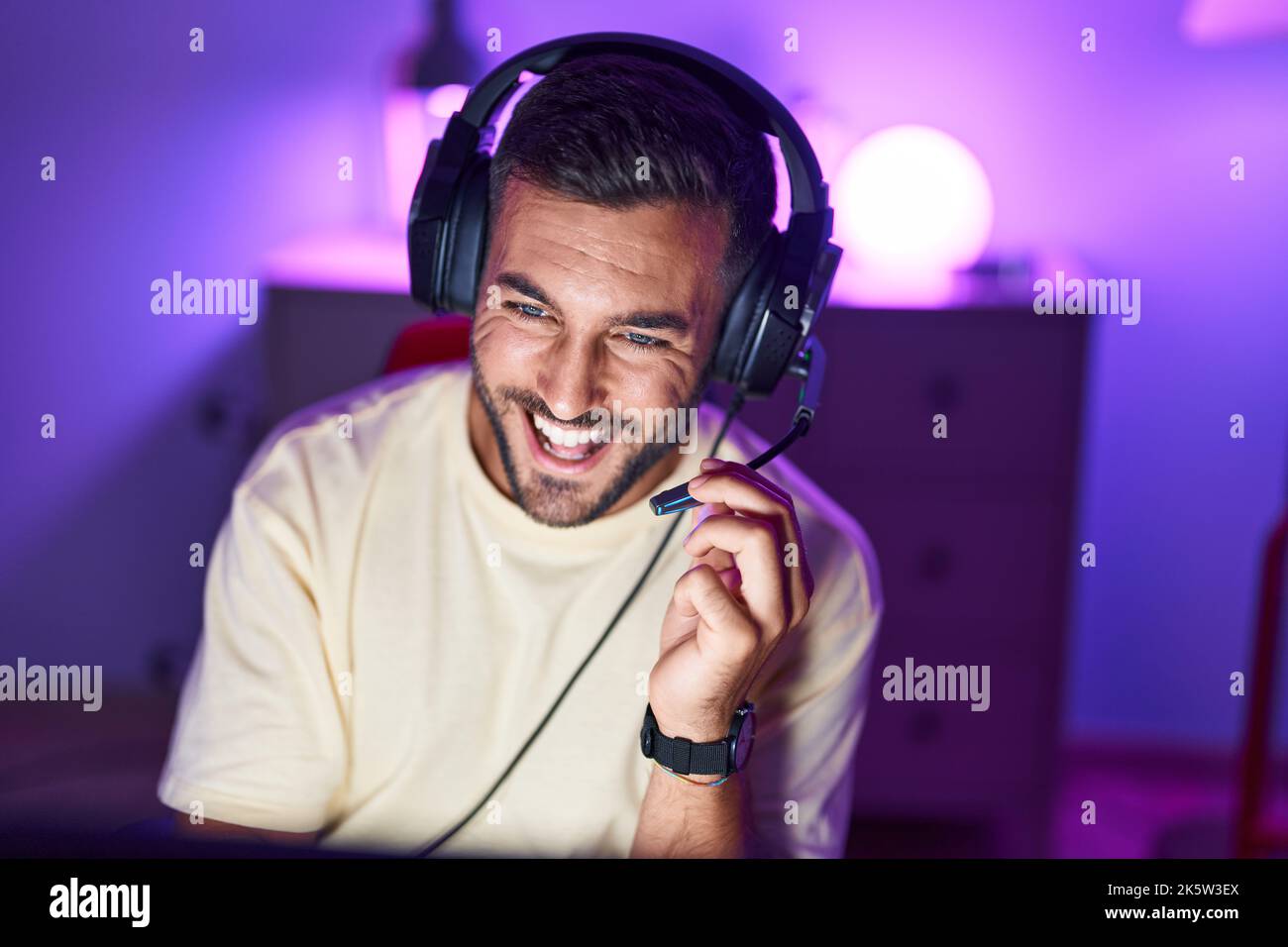 Young hispanic man streamer smiling confident having video call at ...