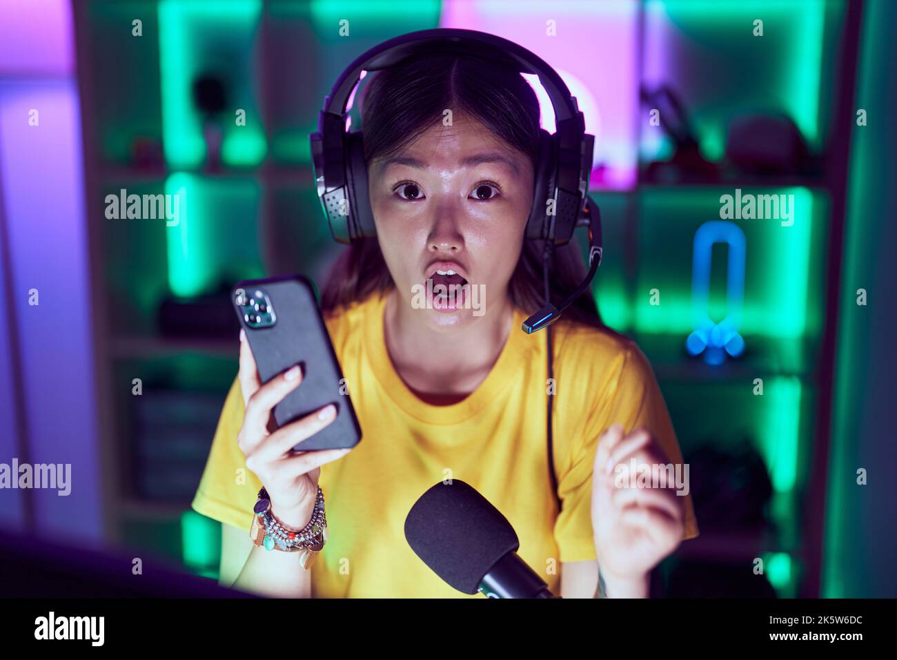 Funny asian woman gamer playing hi-res stock photography and images - Alamy