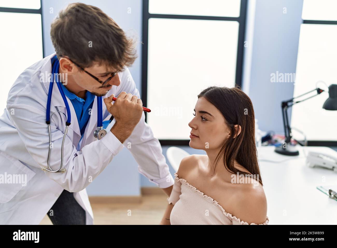 Woman optician wearing uniform hi-res stock photography and images - Alamy
