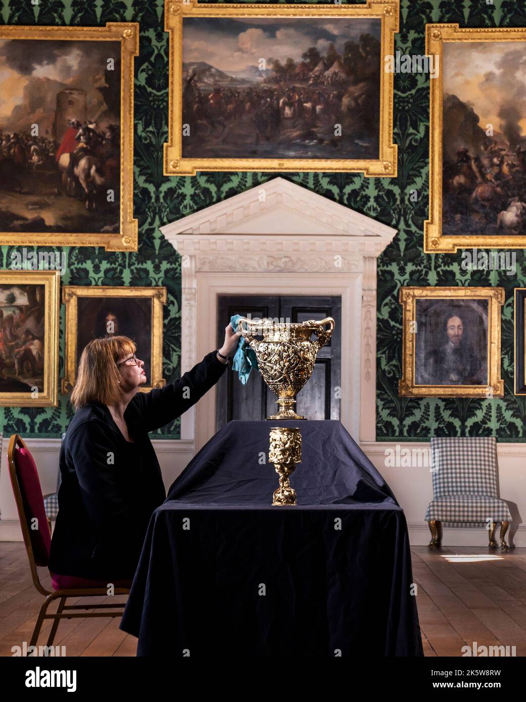 Curator Emma Bowron polishes the silver gilt Doncaster Gold Cup 1828 ...