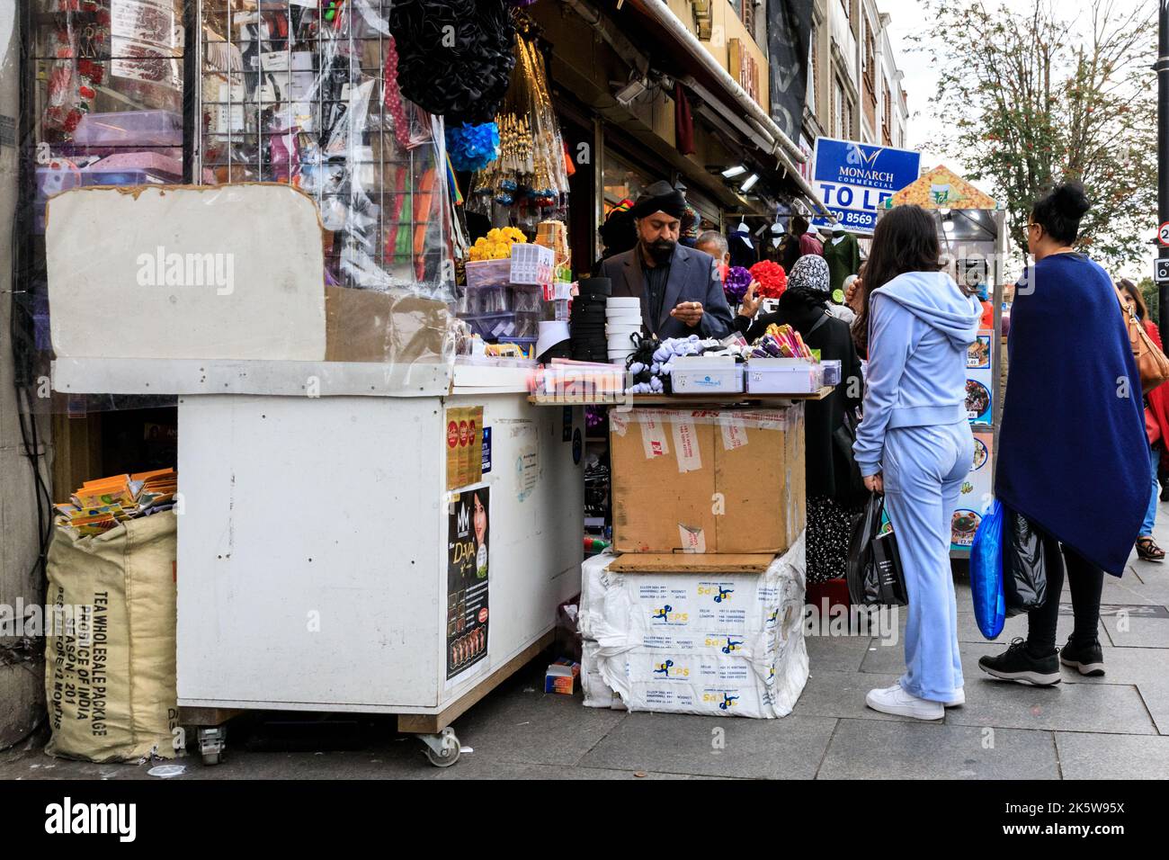 Punjabi, Indian and Asian shops and people shopping in Southall High ...