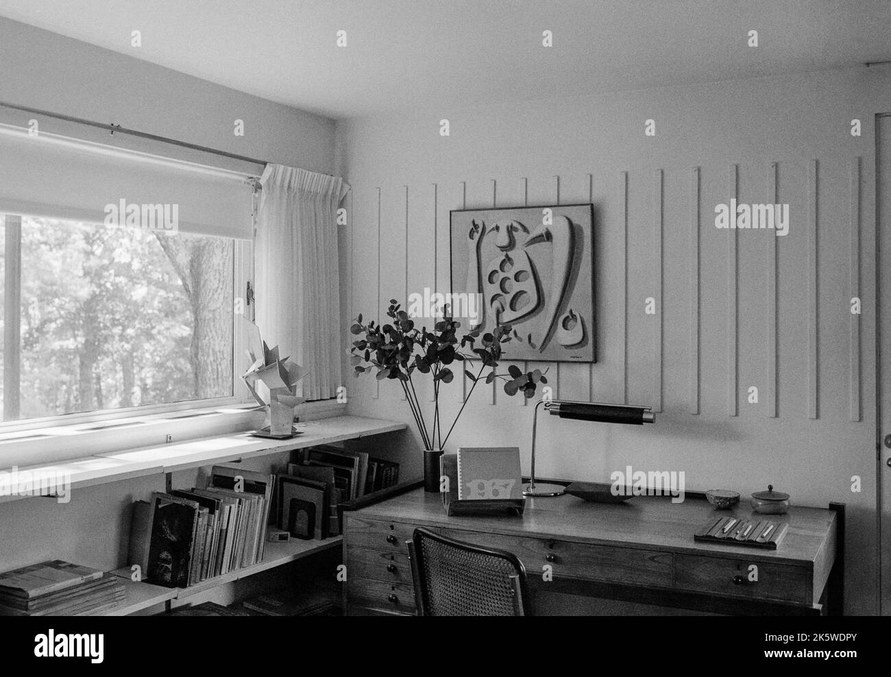 A child's bedroom, desk, books, and window at the historic Bauhaus ...