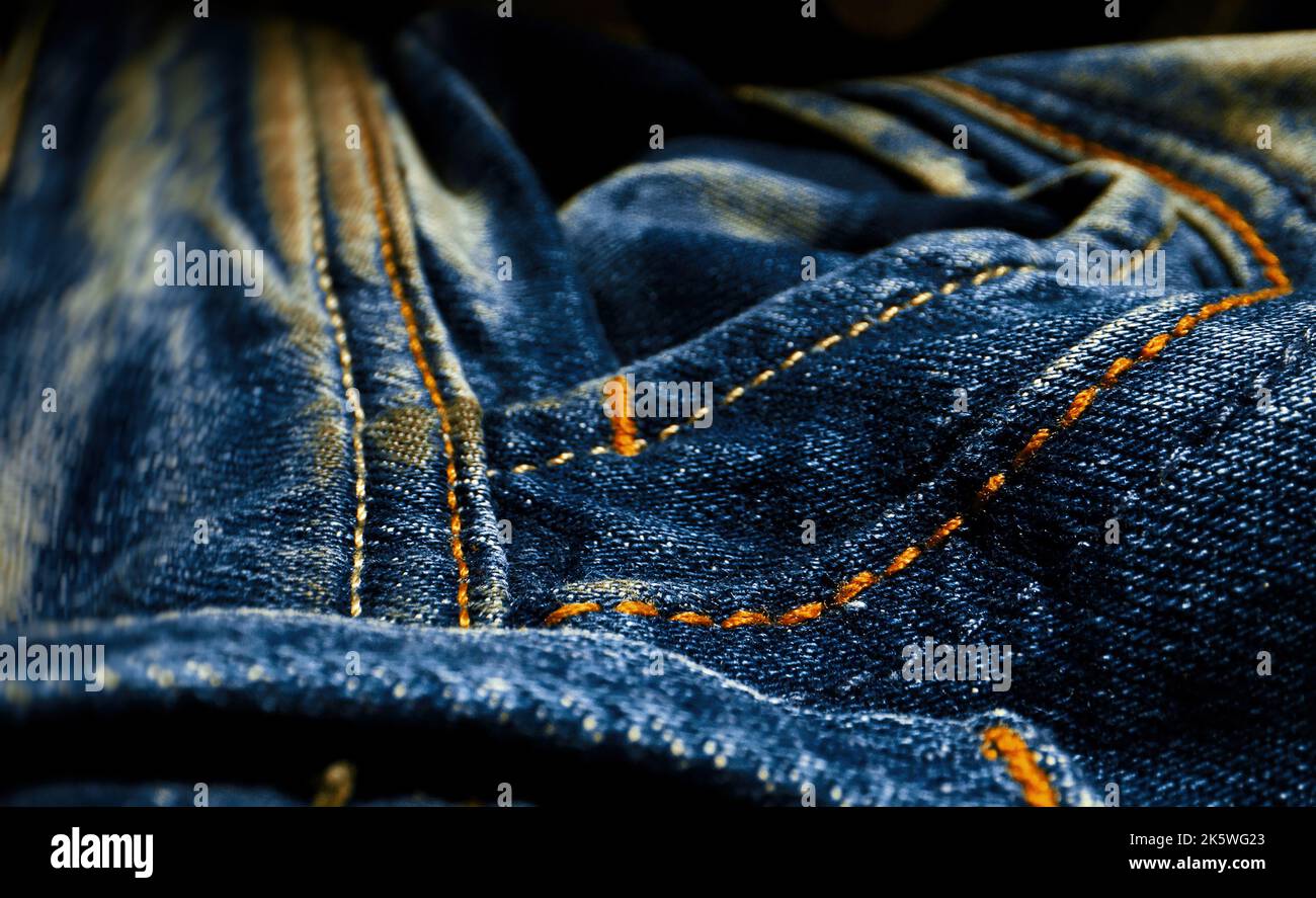 Denim blue jeans fabric texture. Close-up Stock Photo - Alamy