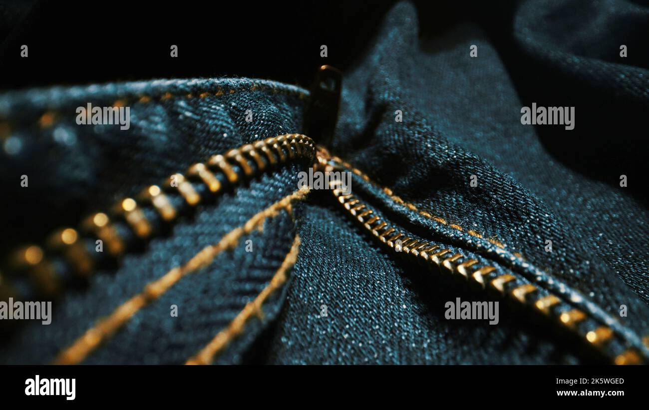 Denim blue jeans fabric texture. Close-up Stock Photo - Alamy