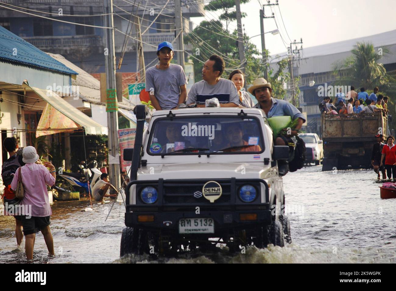 Thai people natural disaster victims use vehicle wading in water on ...