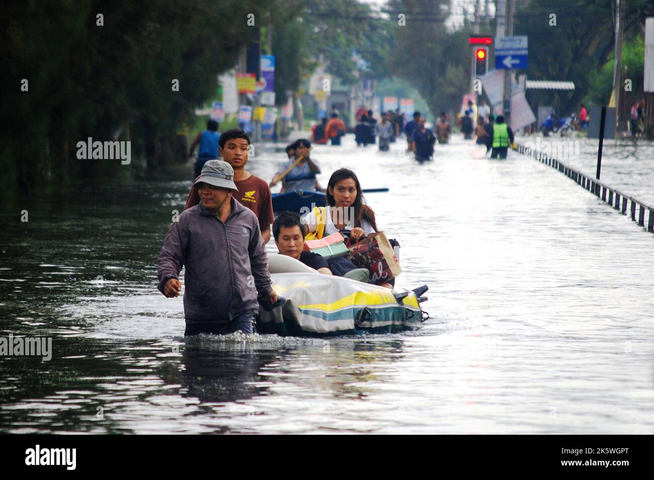 Thai people natural disaster victims use vessel wading in water on ...