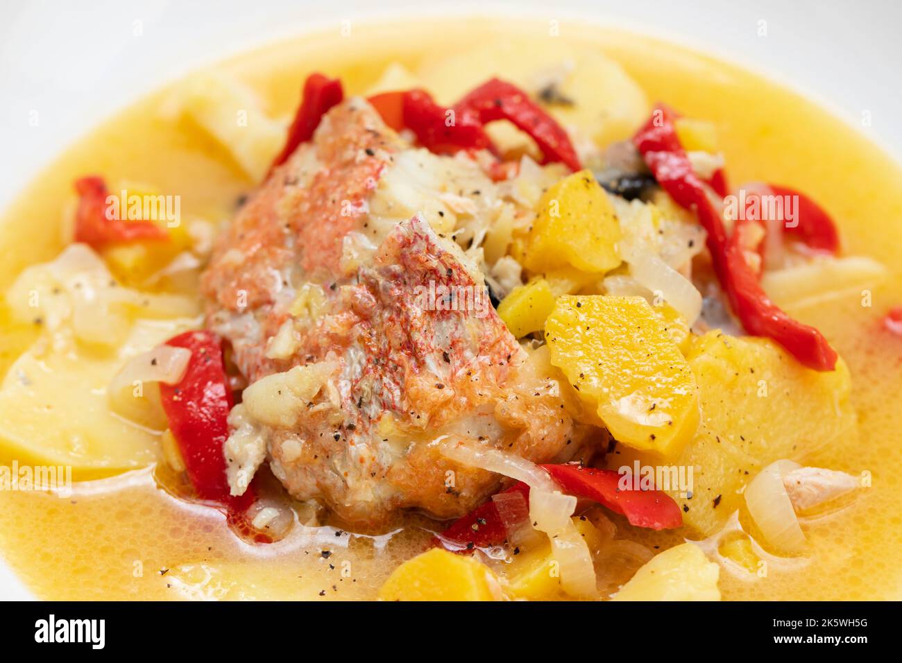 typical portuguese fish stew caldeirada on white plate on ceramic Stock ...