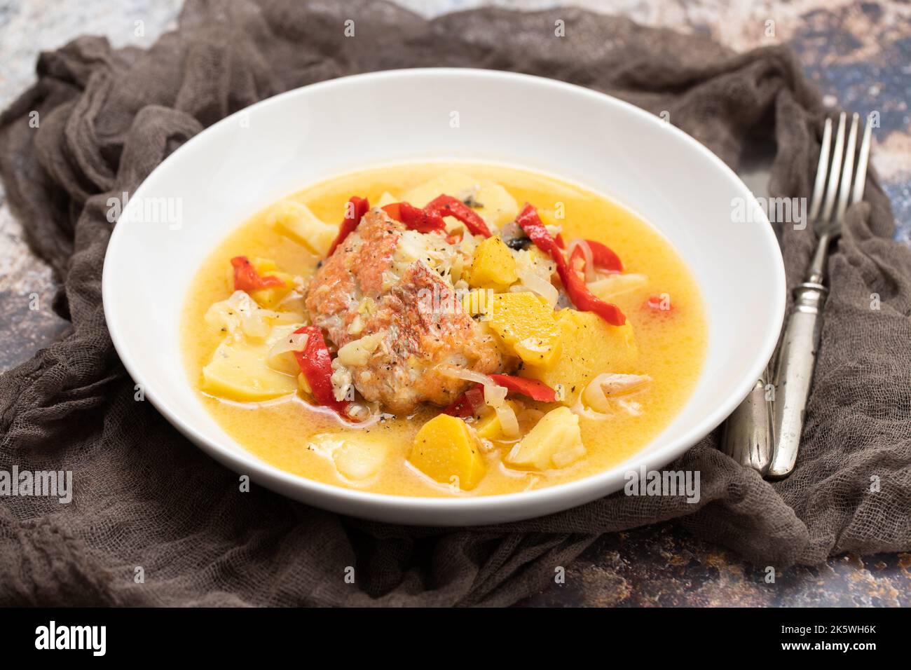 typical portuguese fish stew caldeirada on white plate on ceramic Stock ...