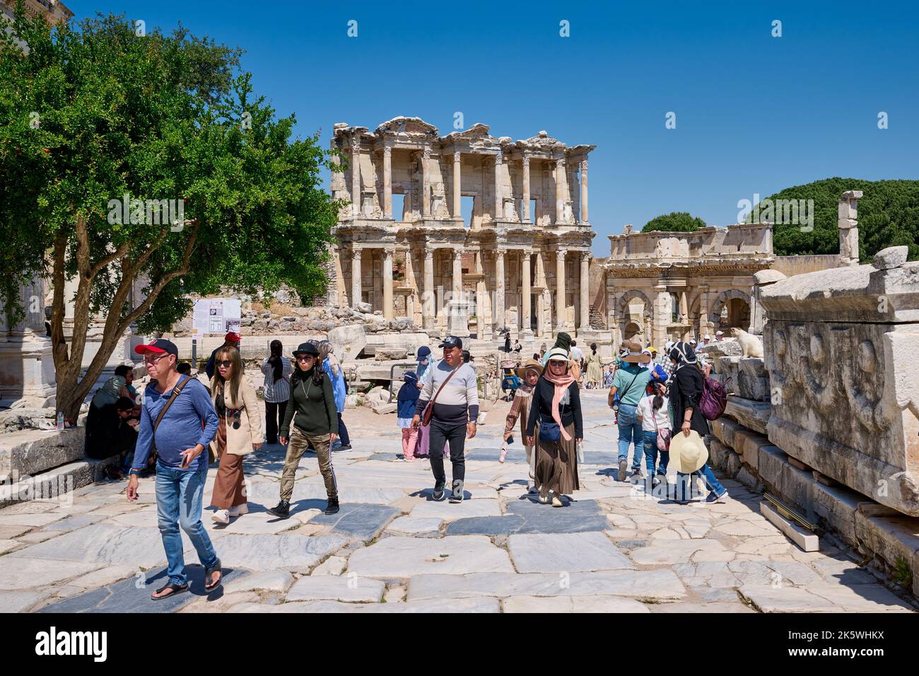 tourists in front of Library of Celsus, Ephesus Archaeological Site ...