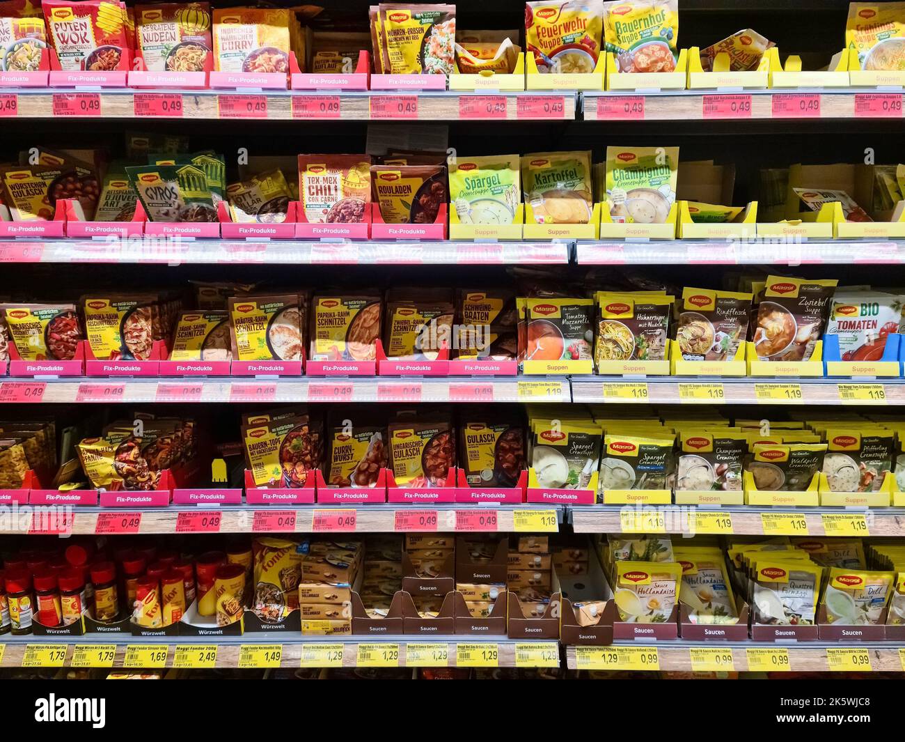 A large shelf of Maggi brand sauce bags on a supermarket shelf Stock ...