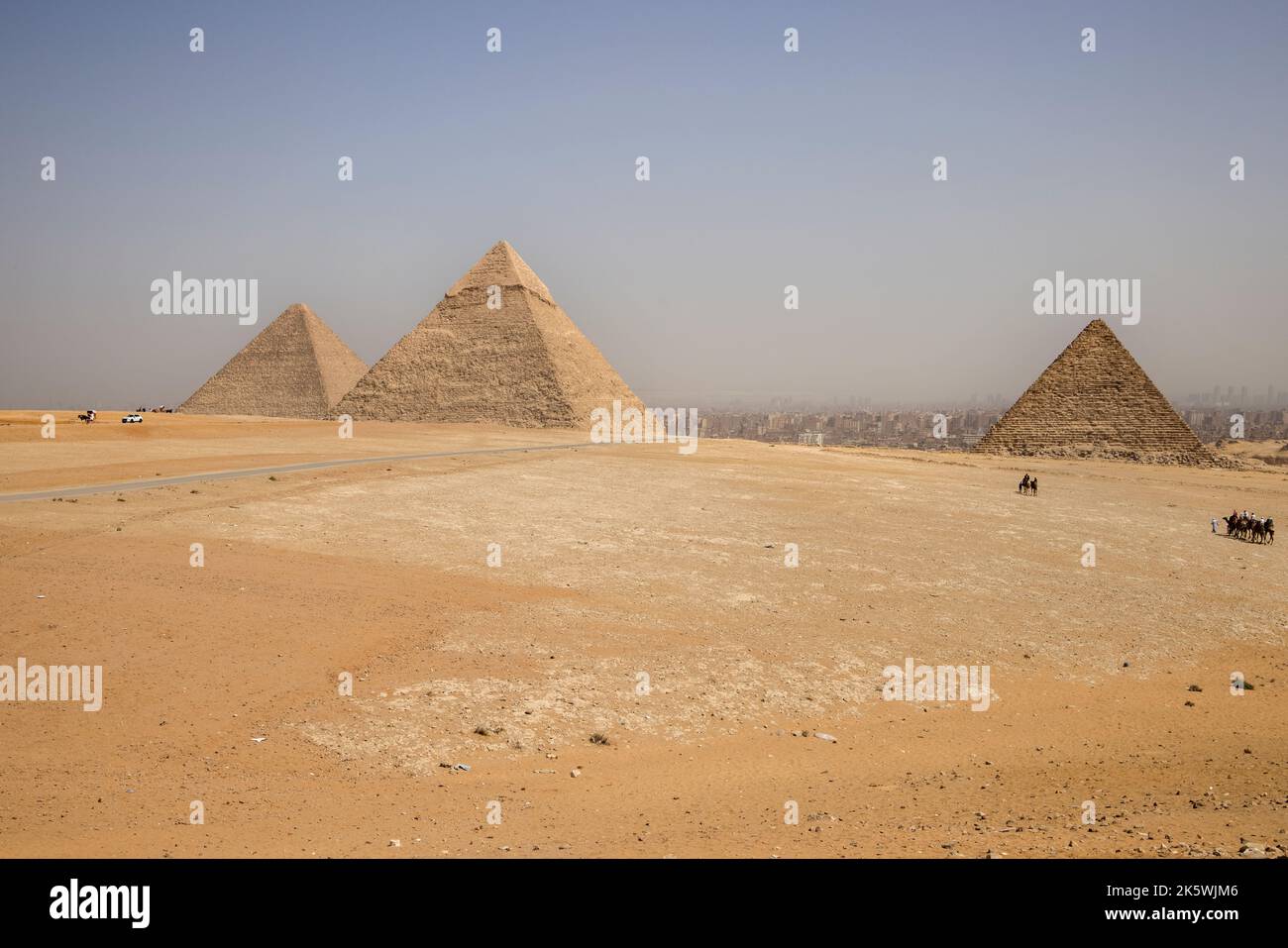 the pyramids of giza on the giza plateau on the west bank of the nile ...