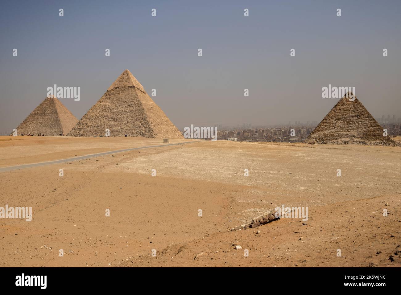 the pyramids of giza on the giza plateau on the west bank of the nile ...