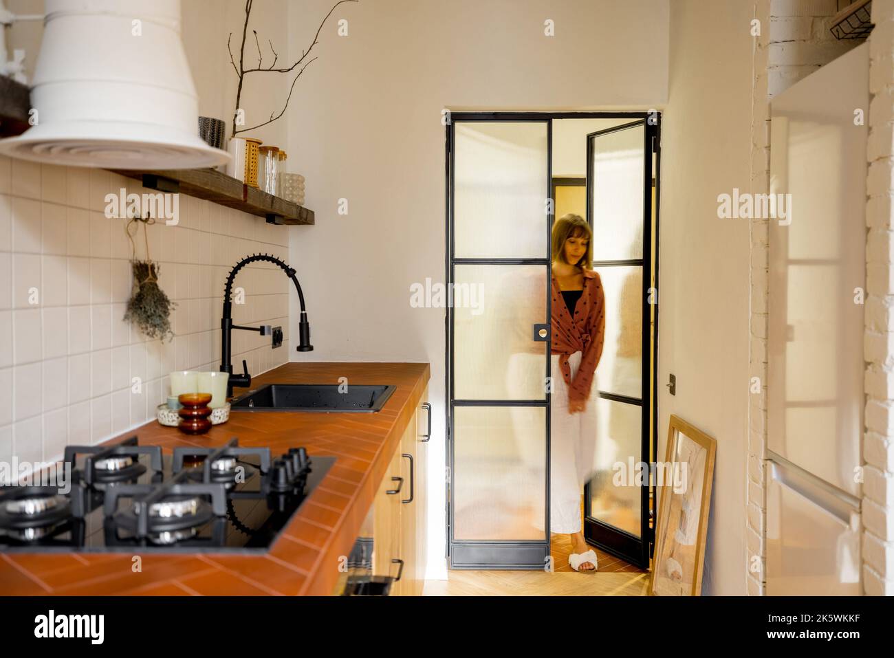 Kitchen blurred figure hi-res stock photography and images - Alamy