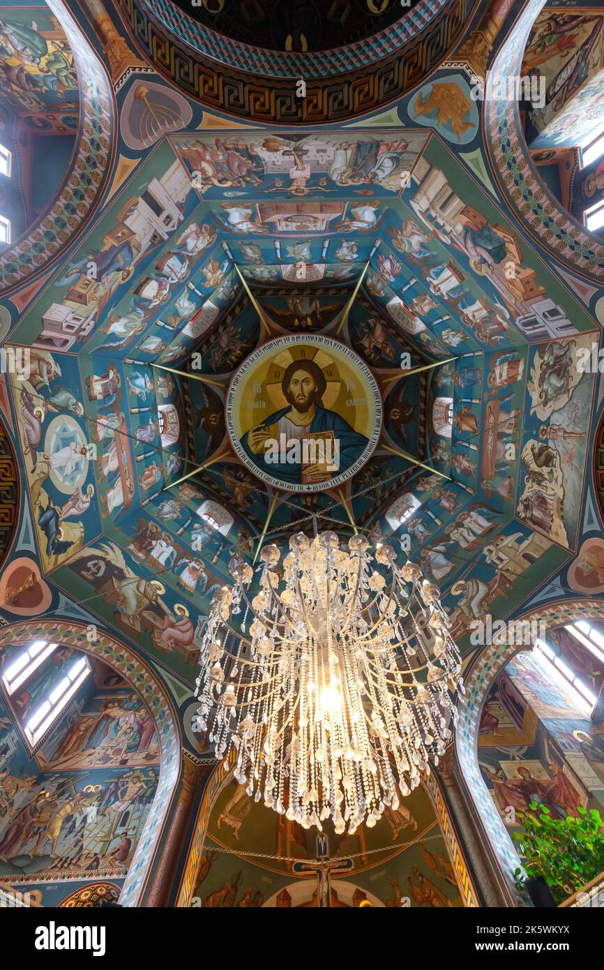 A vertical shot of the painting of Jesus Christ painted on the ceiling ...