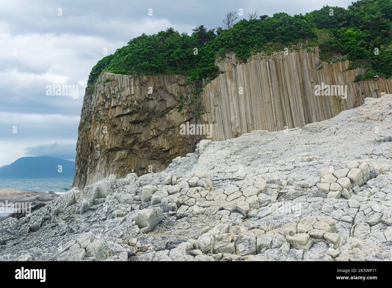 Columnar basalt rock, Cape Stolbchaty on Kunashir Island, in the ...