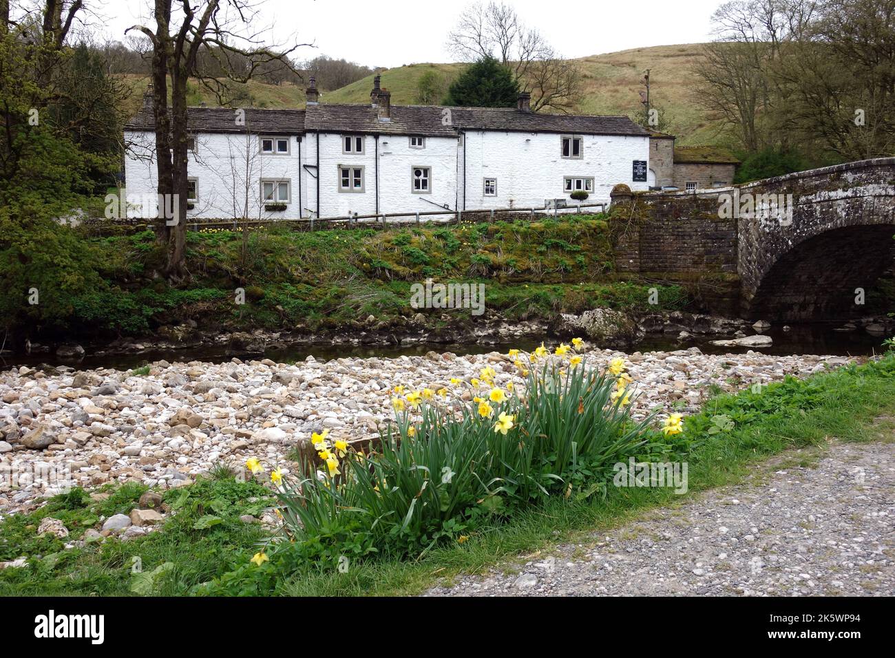The George Inn by the Stone Bridge over the River Wharf in Hubberholme ...