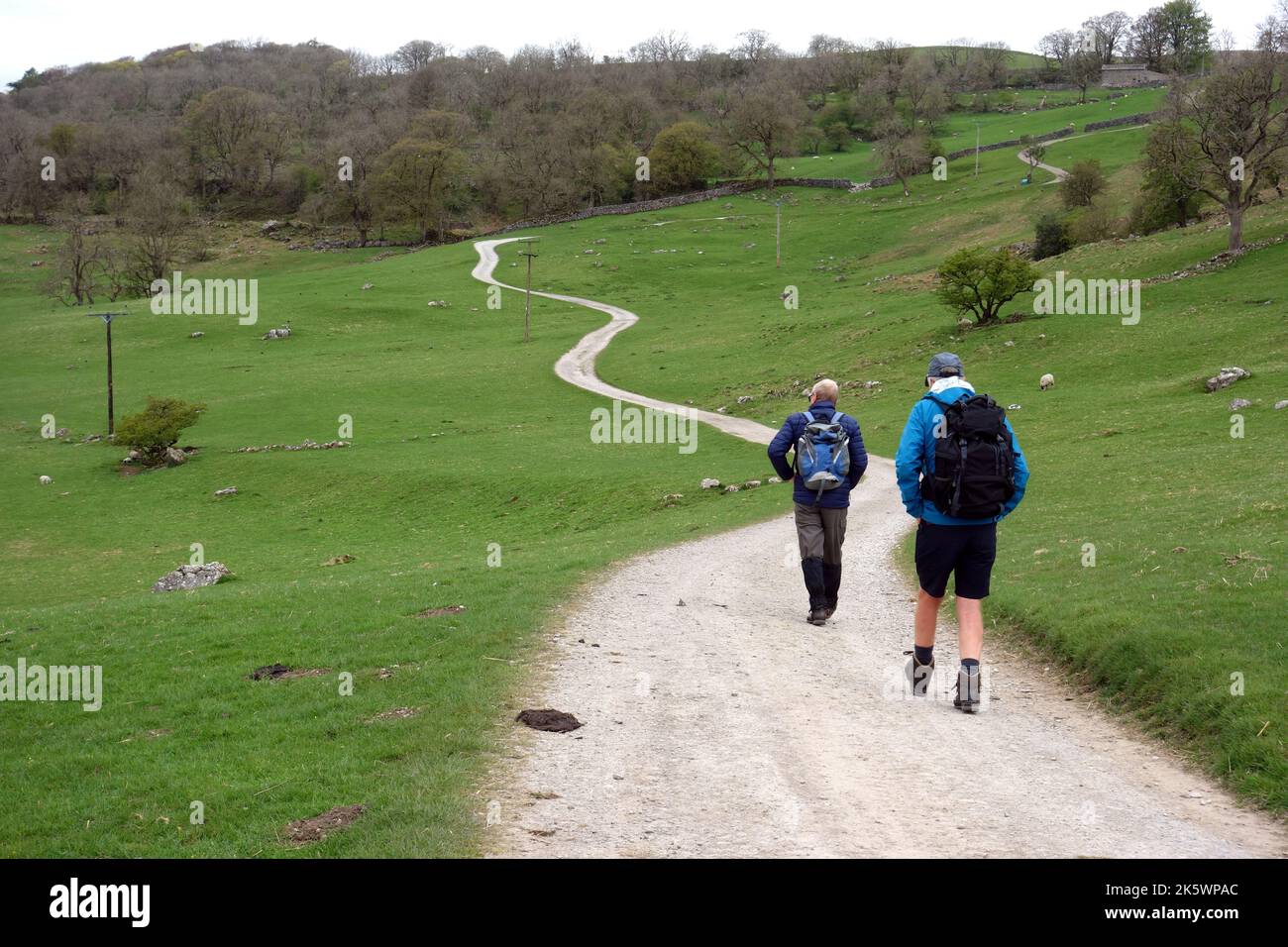 Two Men Walking on Winding Path to Scar House near Hubberholme in ...