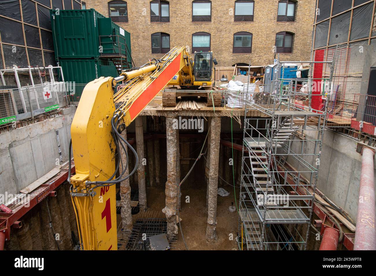 Construction site basement excavation with temporary propping, concrete ...