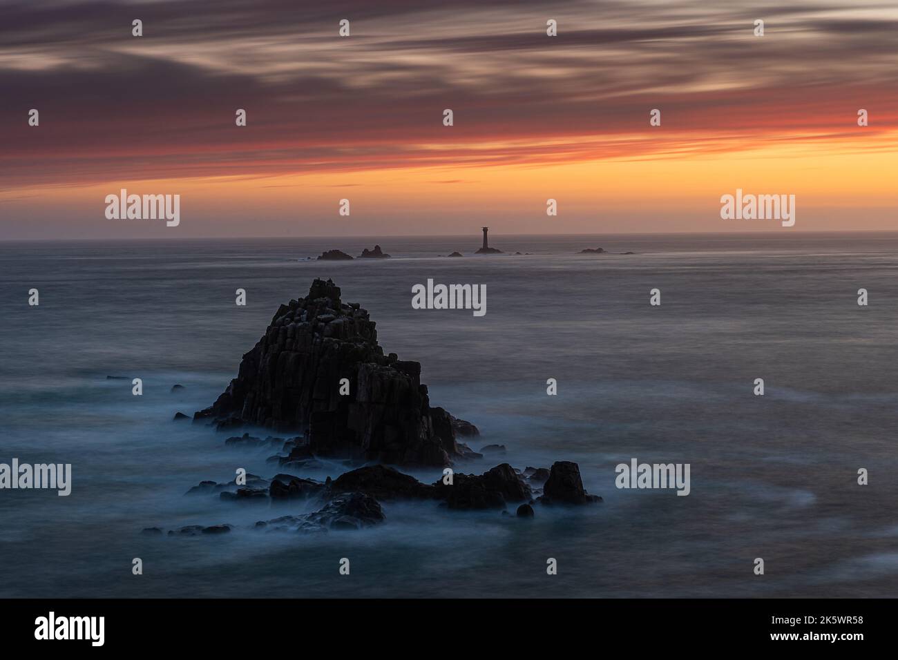 Armoured Knight Rock after sunset, Cornwall, United Kingdom Stock Photo ...