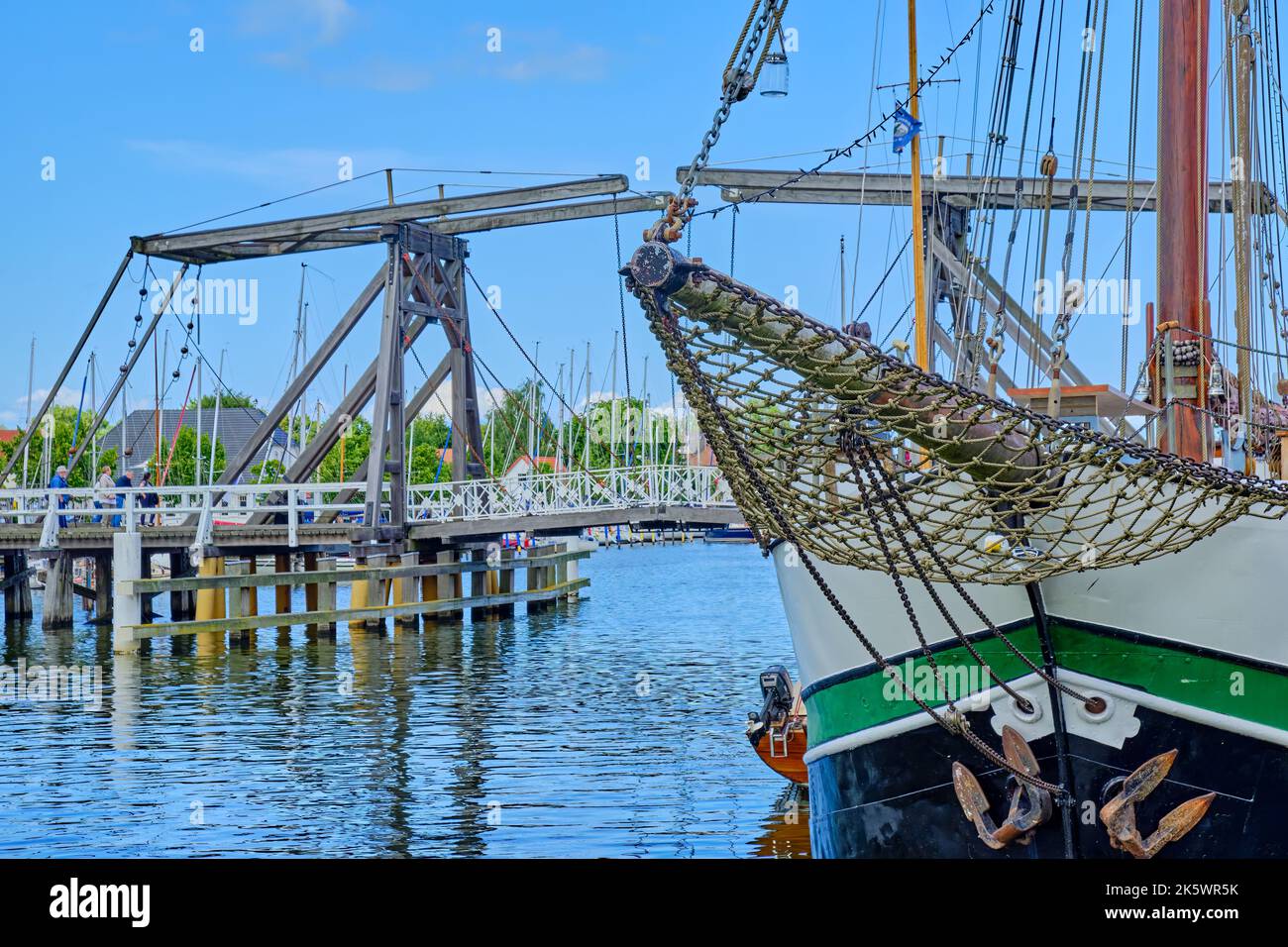 Bowsprit and bow of two sailing ship in front of the picturesque ...