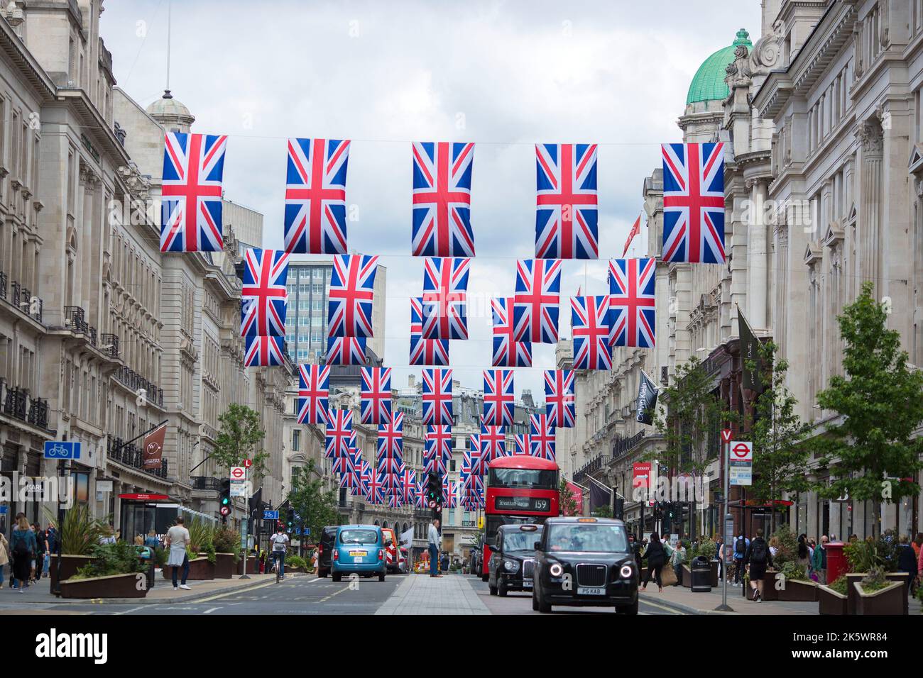 Union flag decorations are seen in Regent Street, central London, ahead ...
