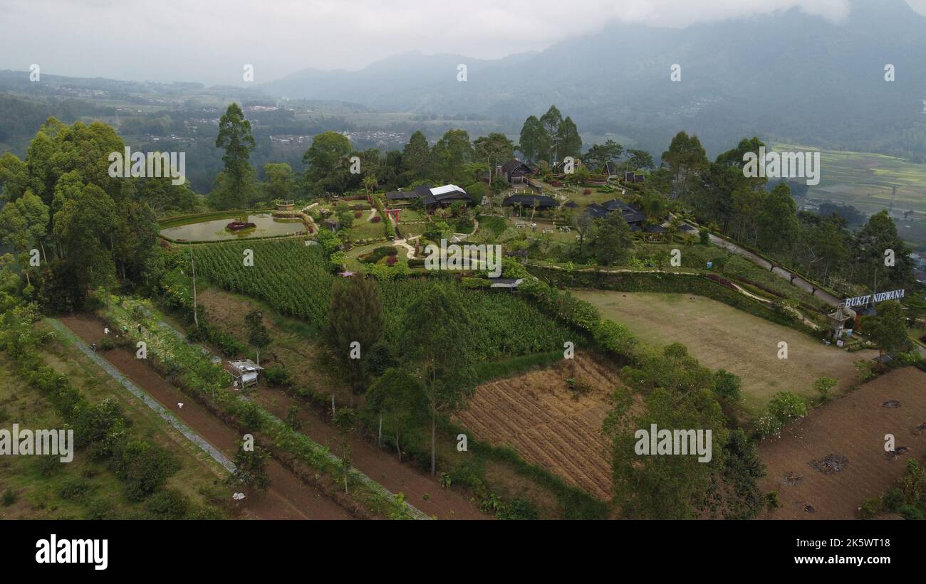 A high angle shot of the Java island greenery and buildings in ...