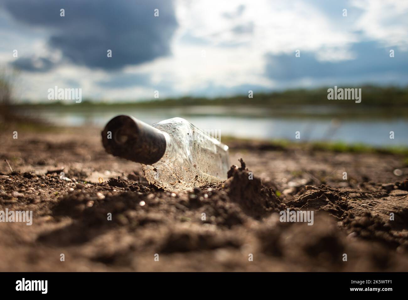 Abandoned garbage in nature. Environmental damage caused by garbage ...