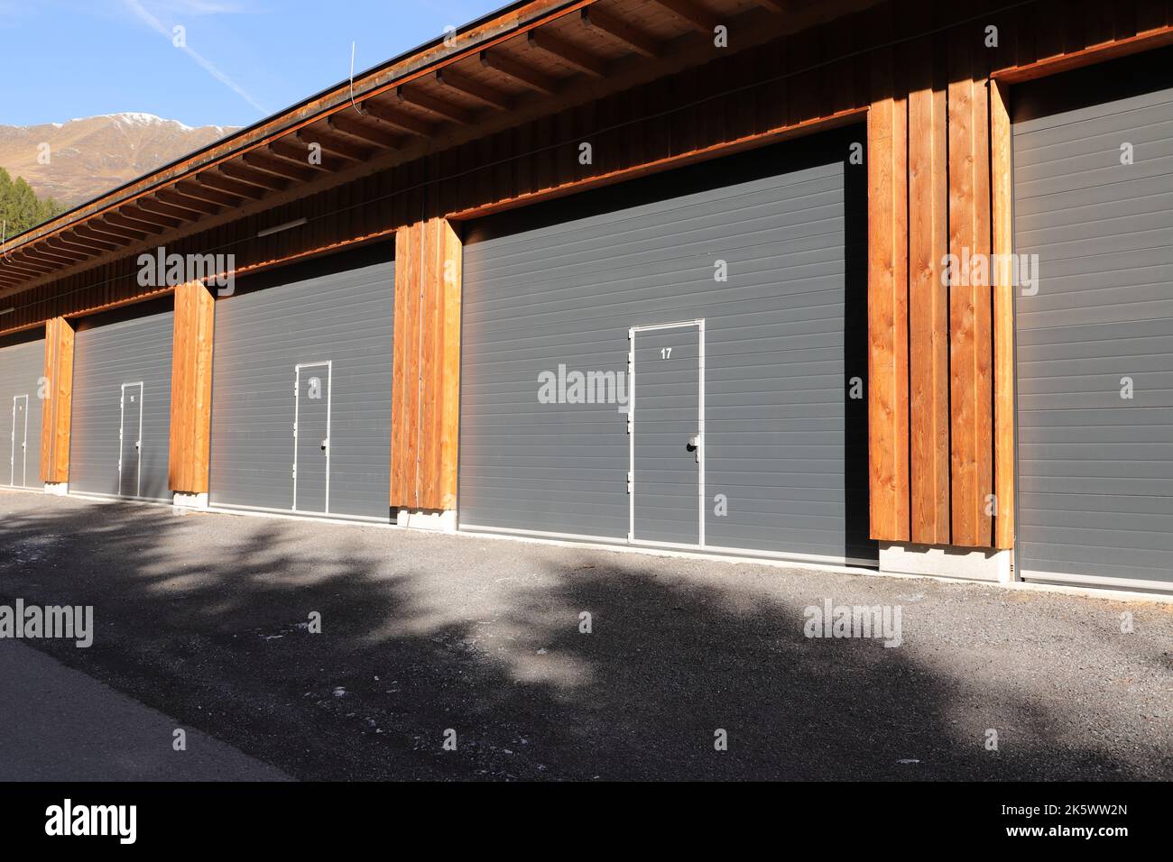 many gates of a warehouse Stock Photo - Alamy