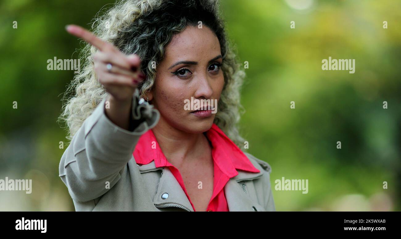 Woman annoyed making stop sign hi-res stock photography and images - Alamy