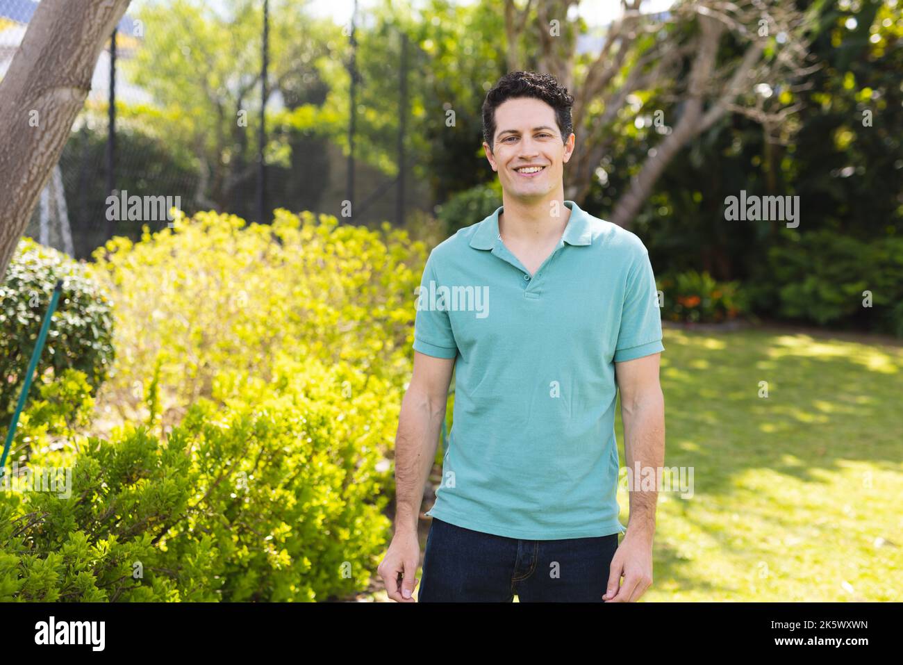 Portrait of young caucasian men wearing blue shirt and standing in the ...