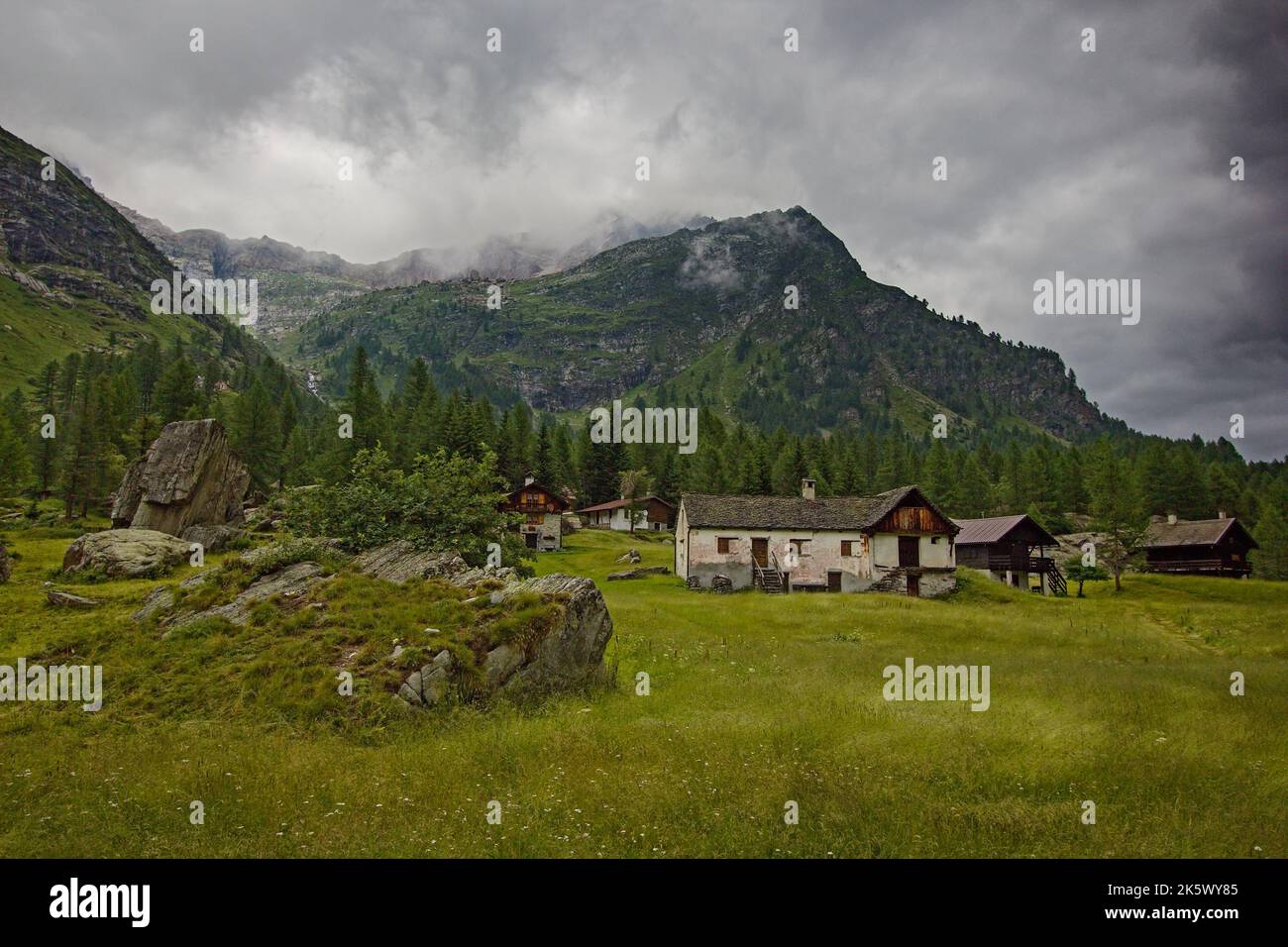 Small village Giavina during the summer storm with a dark sky - Alpe ...