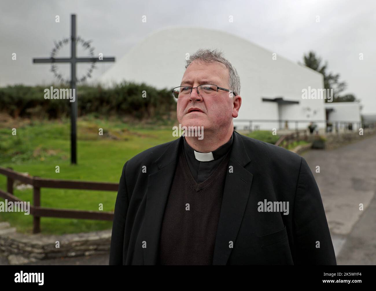Parish priest Father John Joe Duffy outside St Michael's church in the ...