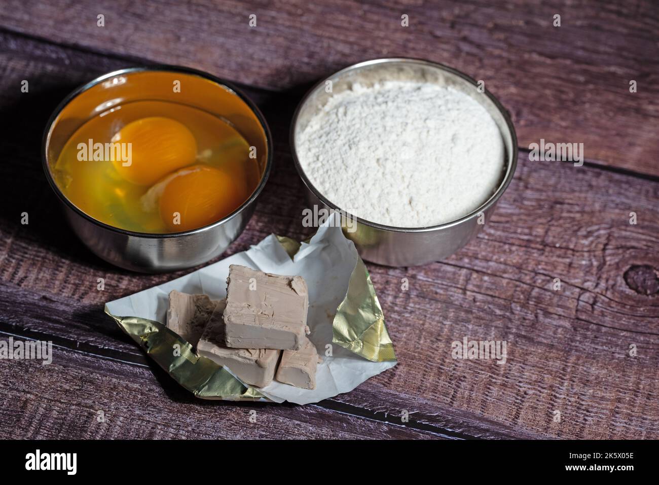 Baking yeast with eggs and flour Stock Photo - Alamy
