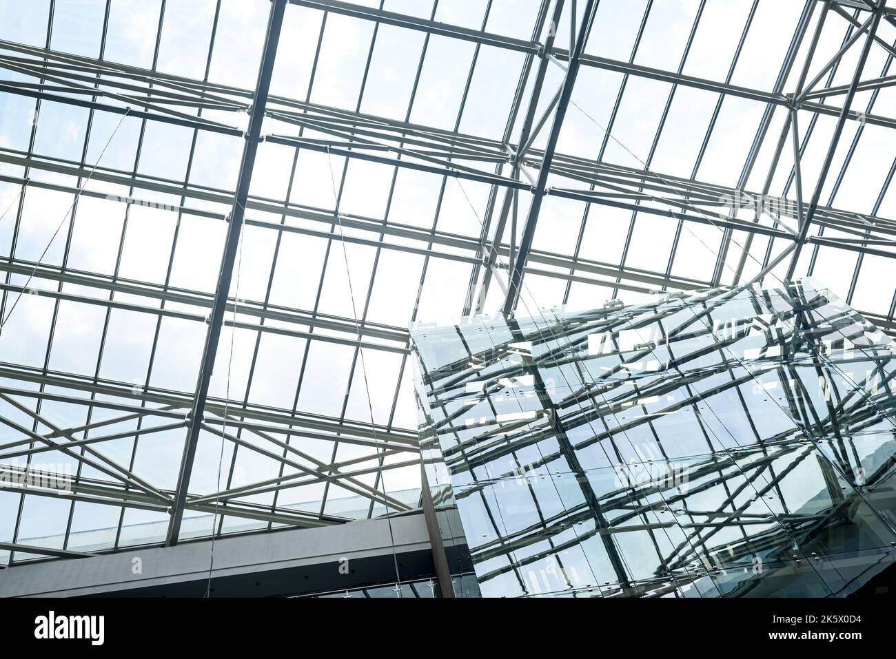 Glass roof in shopping mall letting sun to illuminate Stock Photo - Alamy