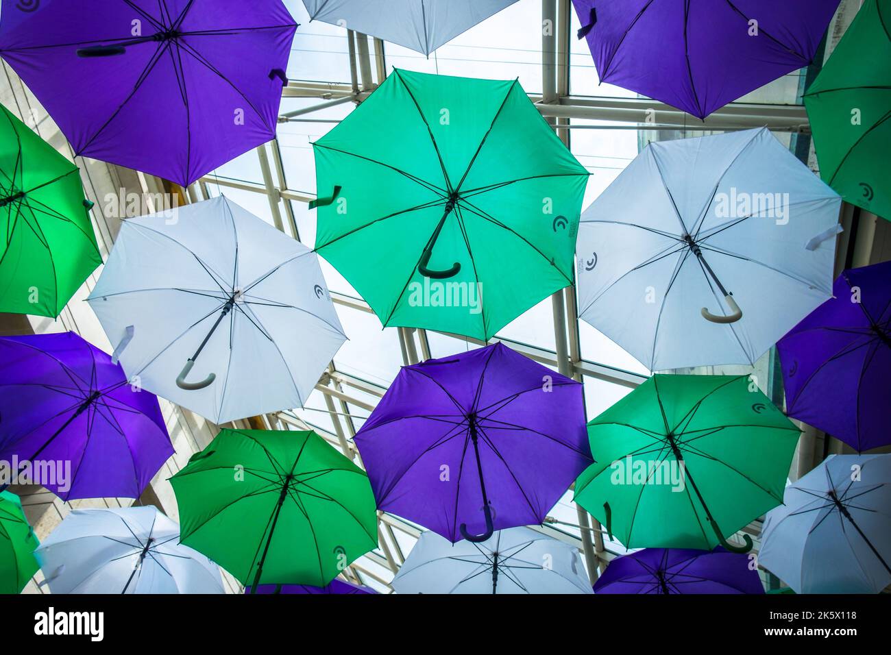 Suspended umbrellas inside a London building Stock Photo - Alamy
