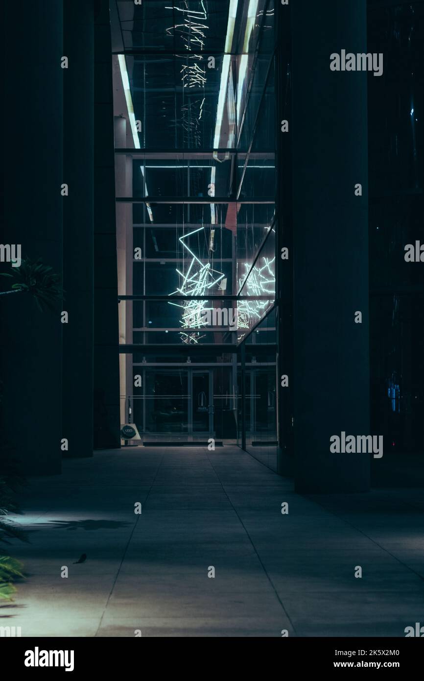A street and abstract lights inside a building at night Stock Photo - Alamy