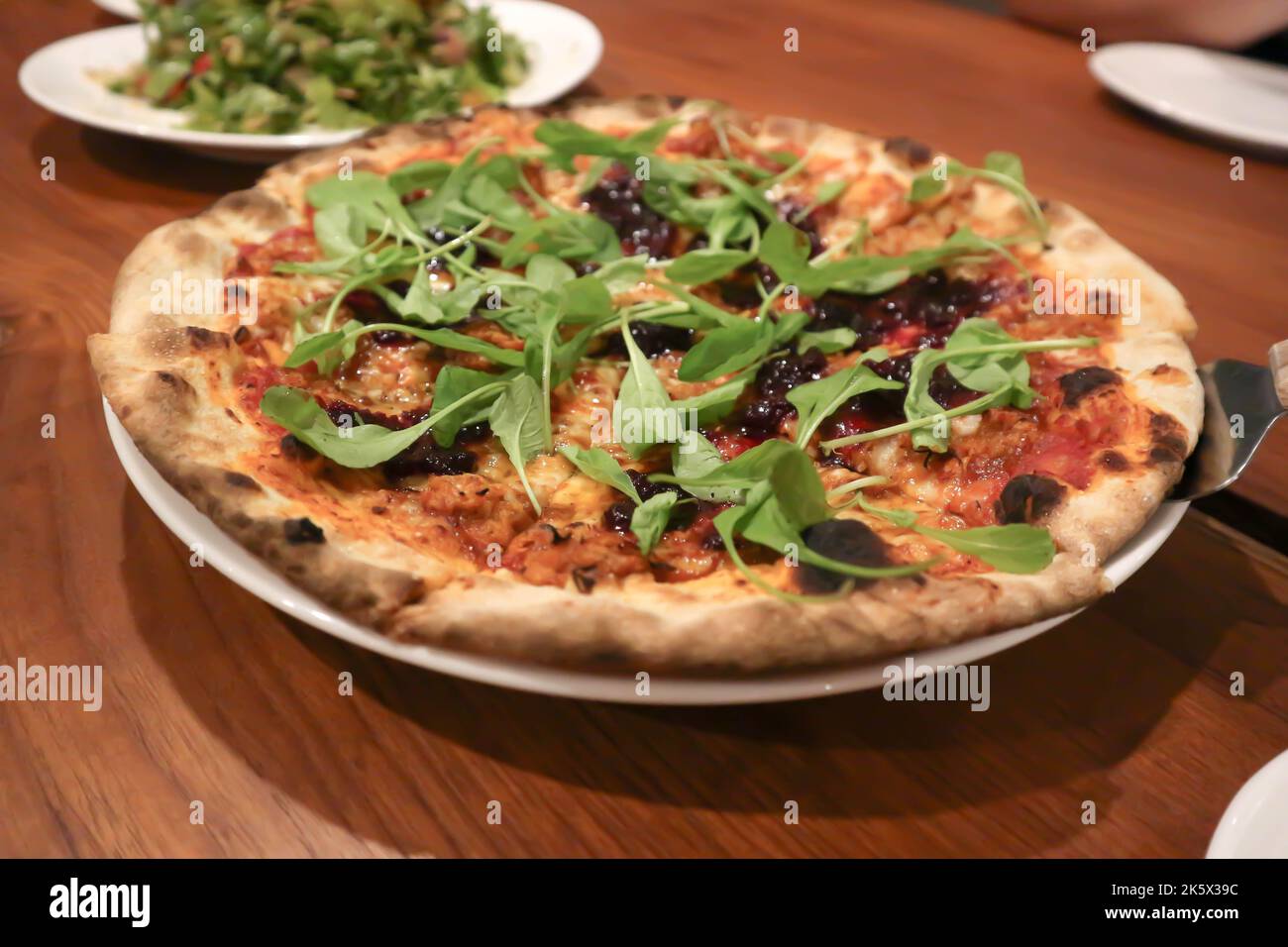 pizza or salami , olive and cheese pizza with vegetable topping Stock ...