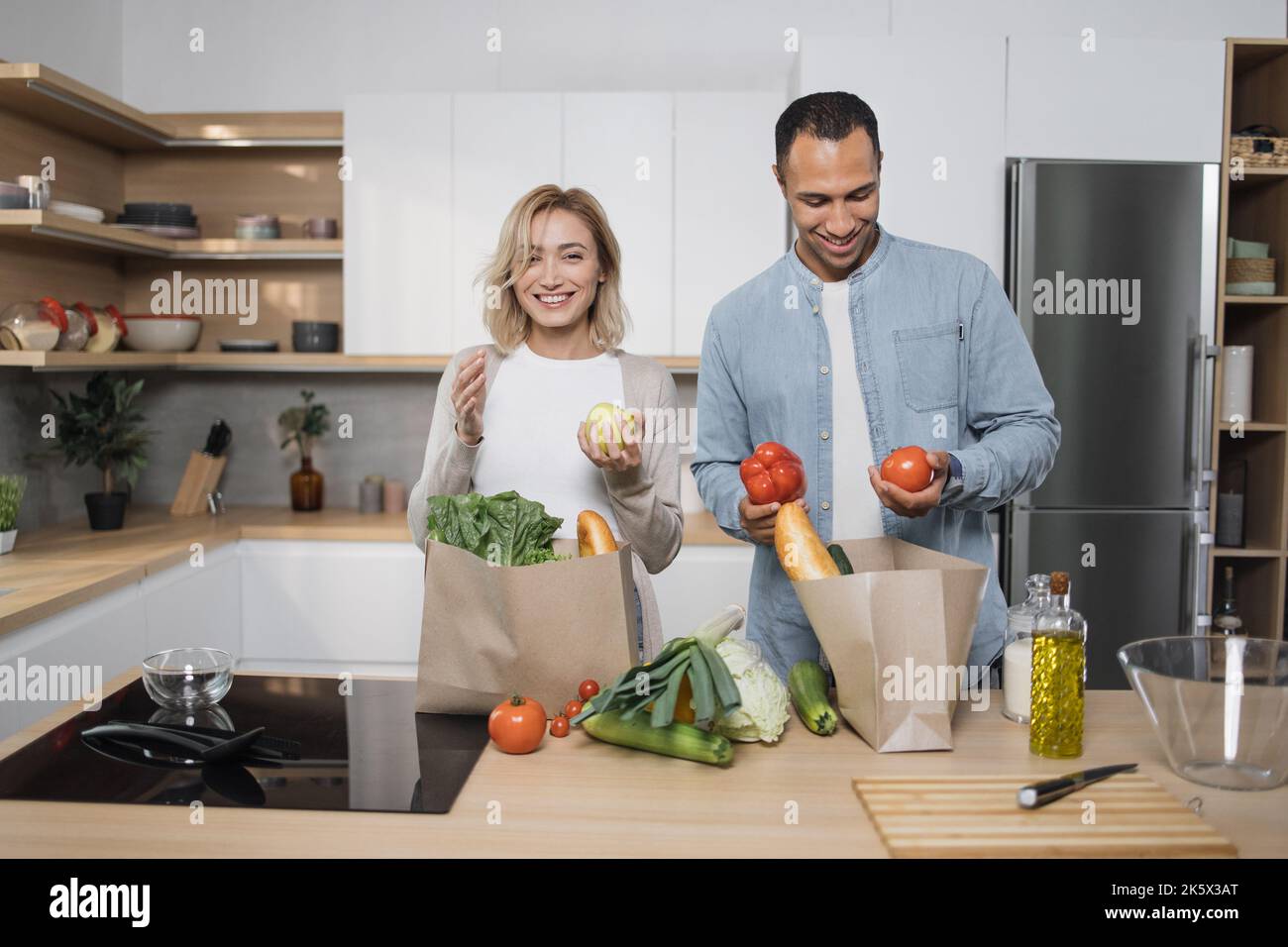 Indian young couple shopping in supermarket hi-res stock photography ...