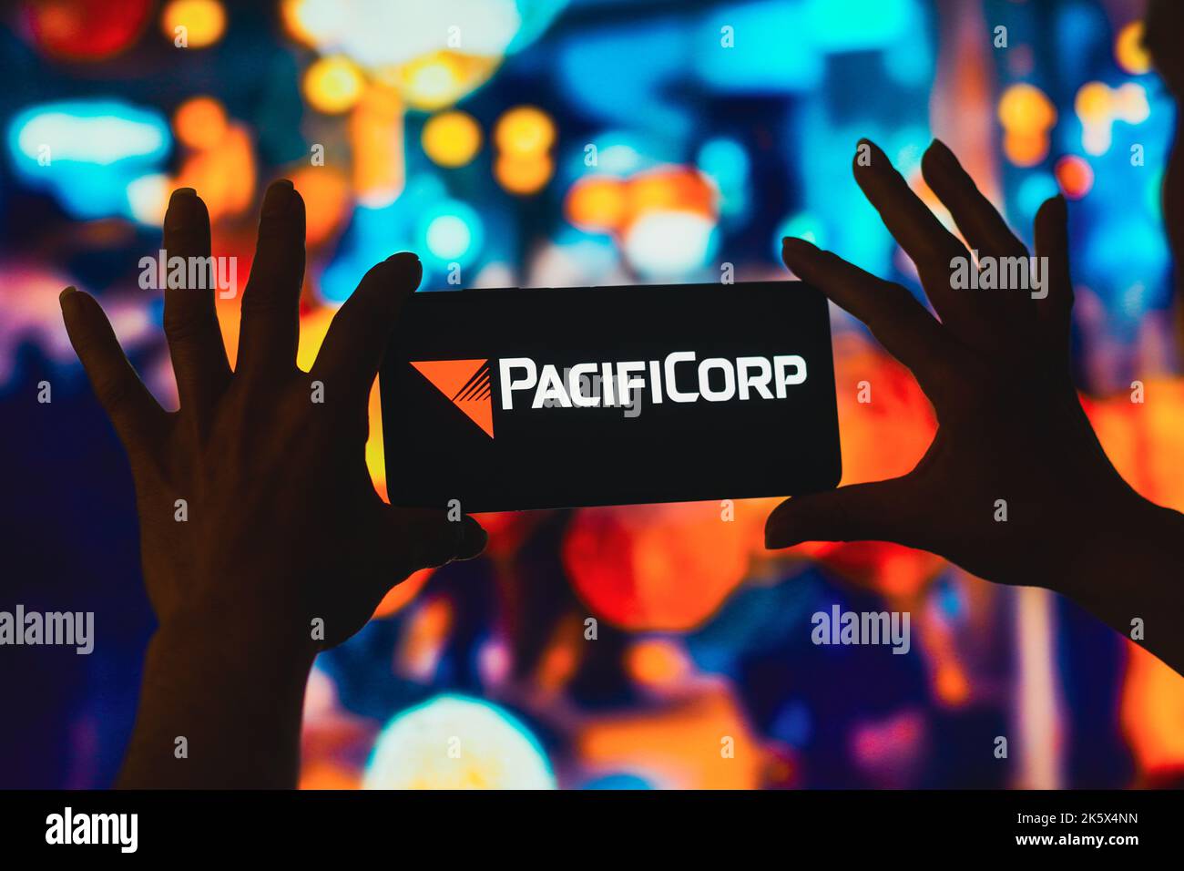 In this photo illustration, the PacifiCorp logo is displayed on a ...
