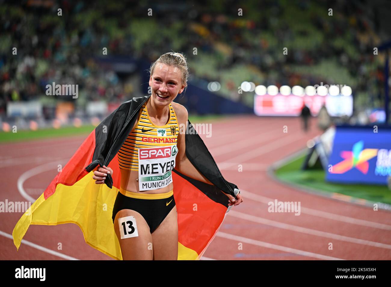 Lea Meyer with her country's flag of the 3000m steeplechase at the ...