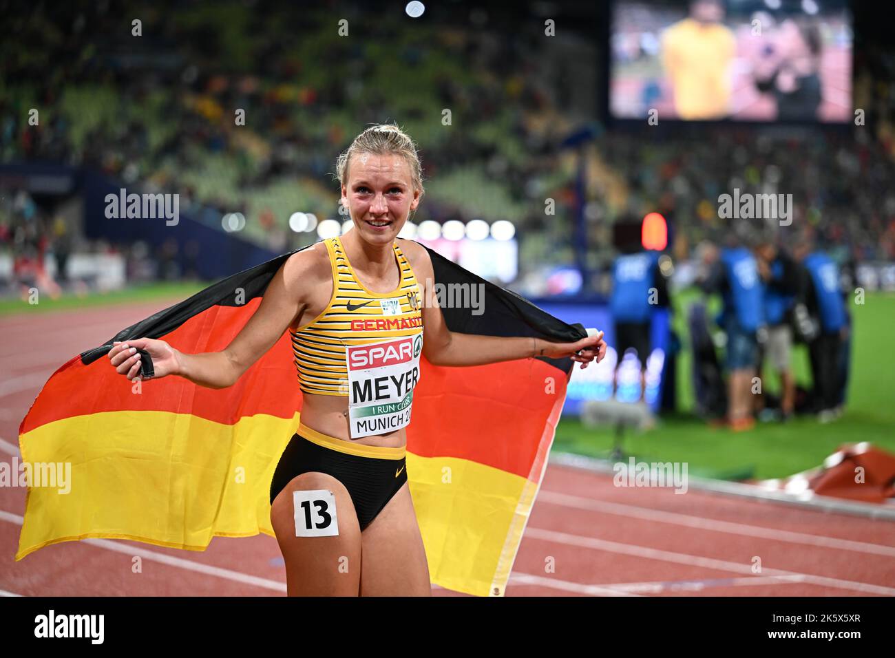 Lea Meyer with her country's flag of the 3000m steeplechase at the ...