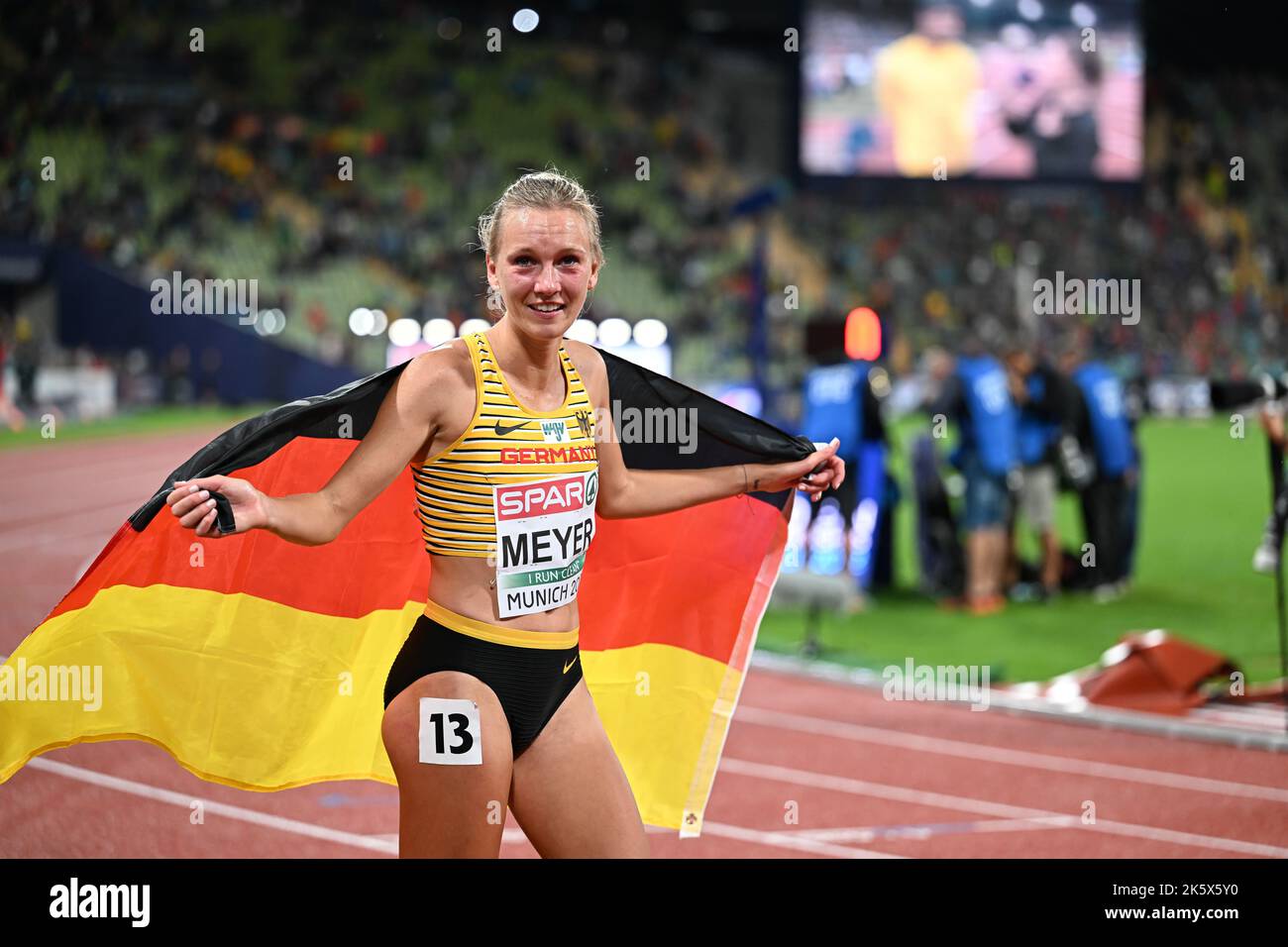 Lea Meyer with her country's flag of the 3000m steeplechase at the ...