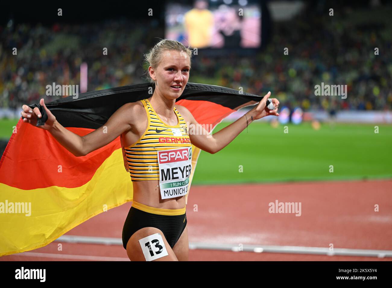 Lea Meyer with her country's flag of the 3000m steeplechase at the ...