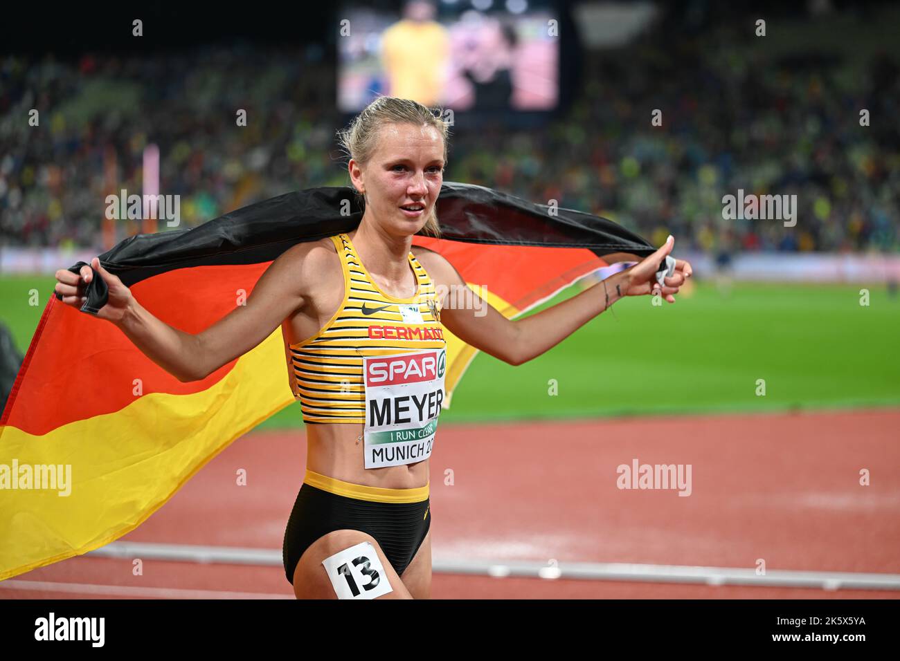 Lea Meyer with her country's flag of the 3000m steeplechase at the ...