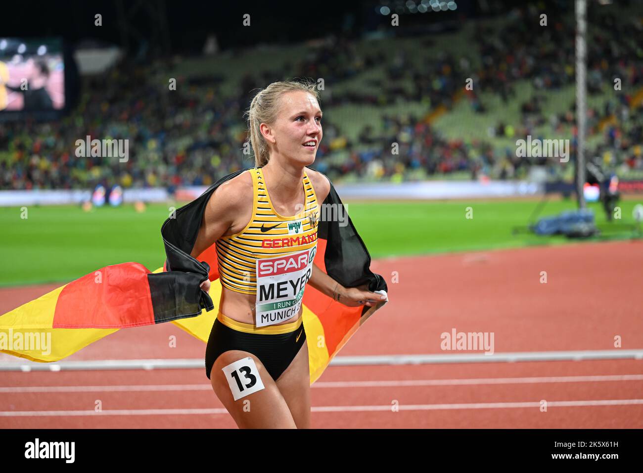 Lea Meyer with her country's flag of the 3000m steeplechase at the ...