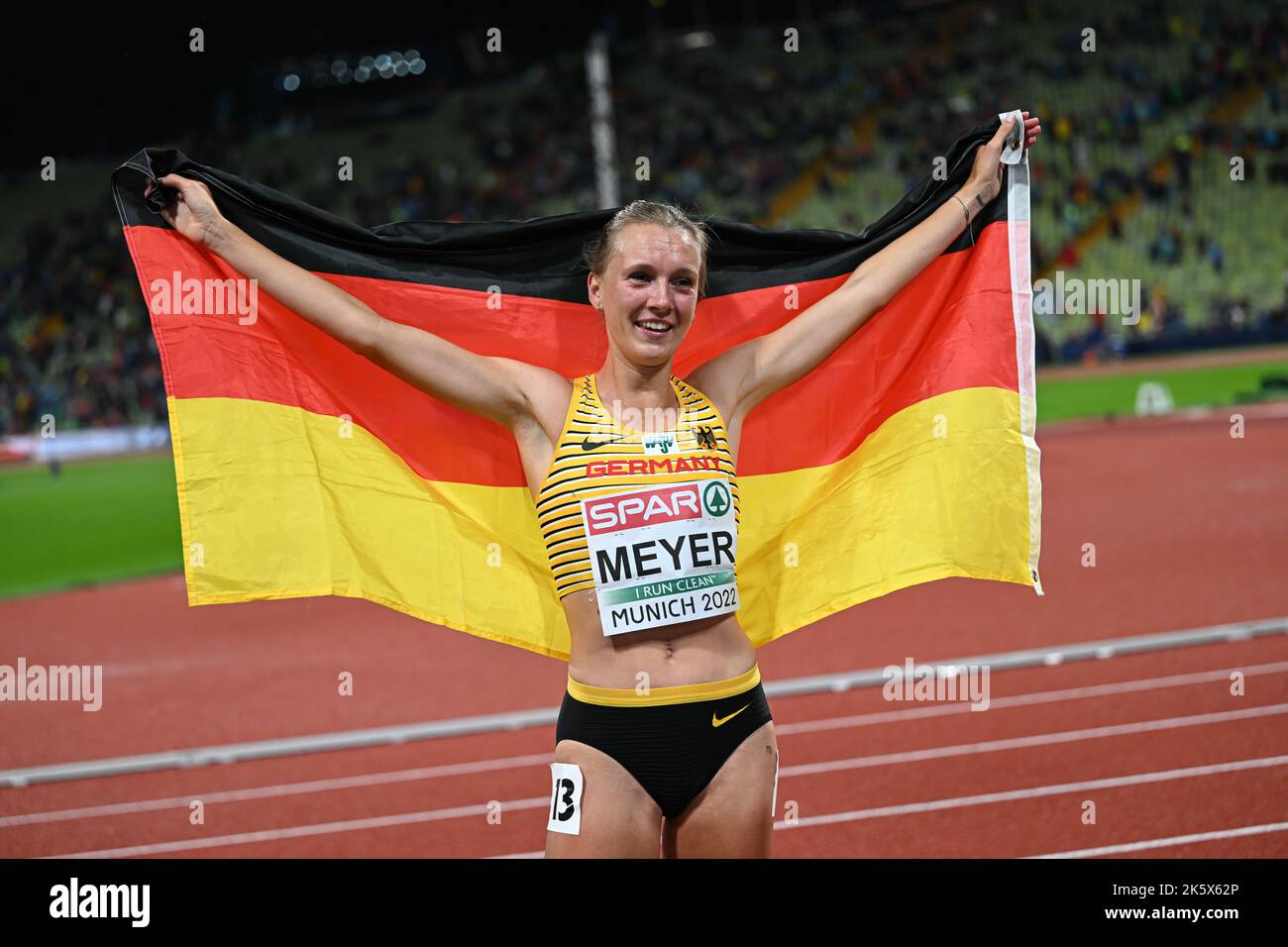 Lea Meyer with her country's flag of the 3000m steeplechase at the ...