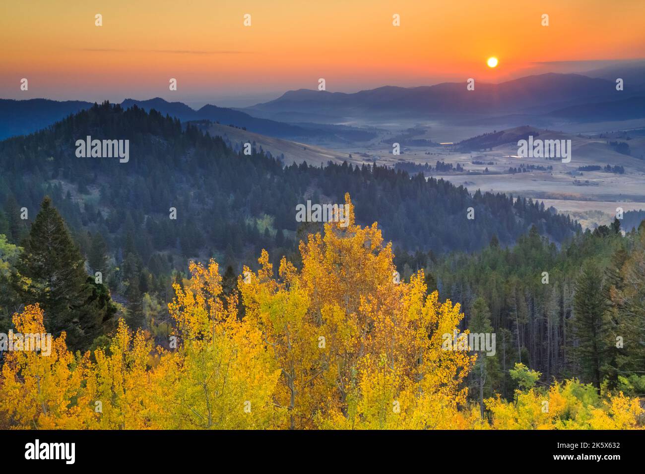 autumn sunrise over the tenmile creek valley below macdonald pass near ...