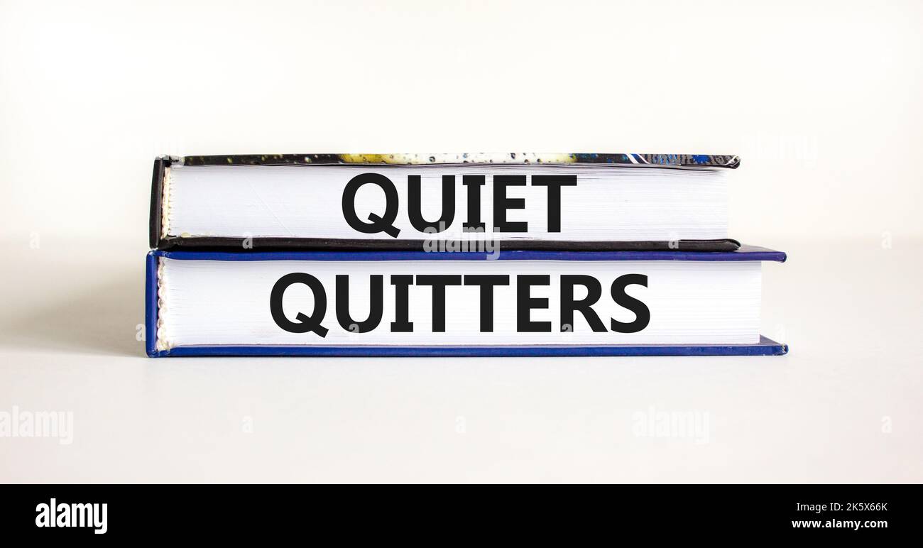 Quiet quitters symbol. Concept words Quiet quitters on books. Beautiful ...